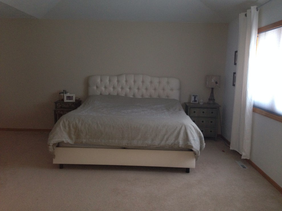 My huge master bedroom looks bare! Need design ideas!