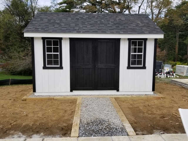 A-Frame style shed with gravel pad and walkway to patio. - Traditional ...