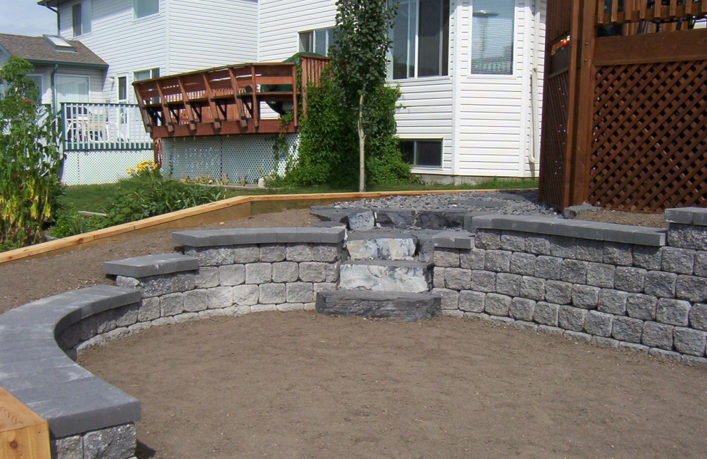 Roman Pisa retaining walls with rundle boulder steps - Calgary - by ...