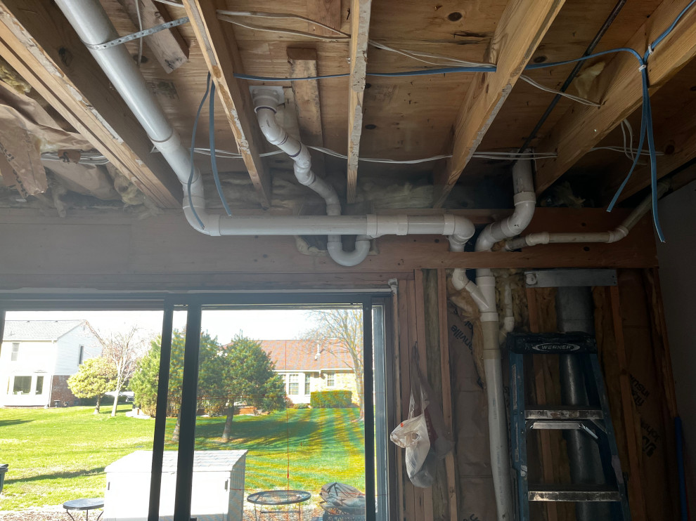 What to build above sliding door to hide pipes