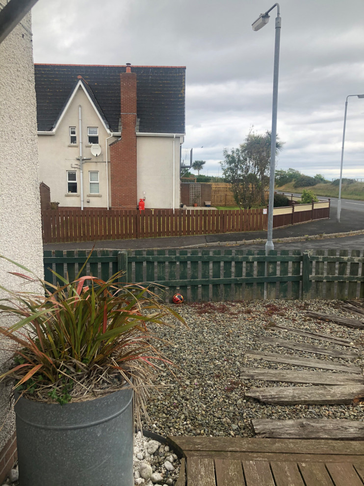 How can I add privacy to my corner garden on busy road? Ideas needed ...