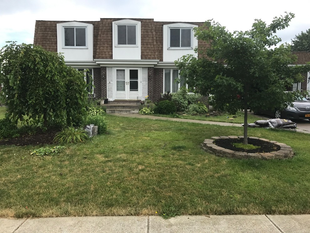 Dumpy looking house... What colors should the doors, shutters, etc be?