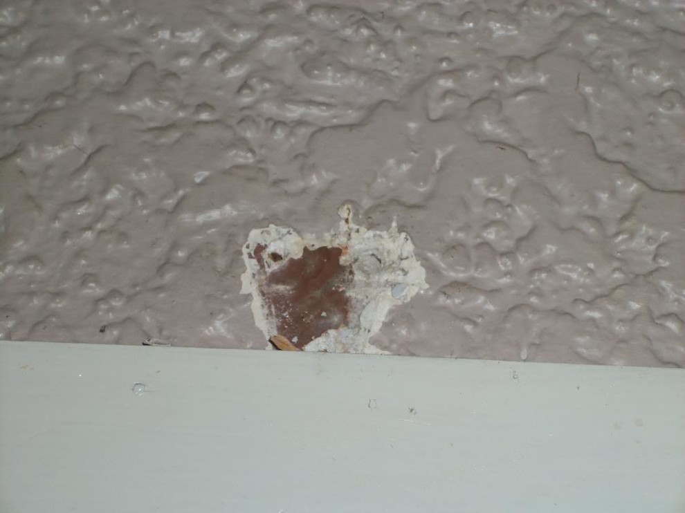 How do I get rid of this horrible wall texture?