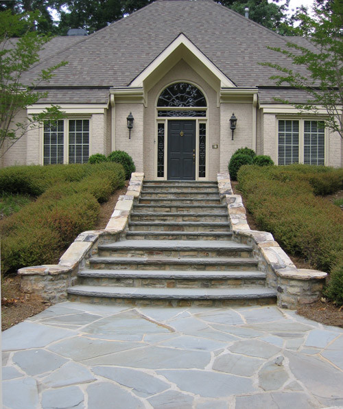 Grand Bluestone and Fieldstone staircase includes cheek walls, landings ...