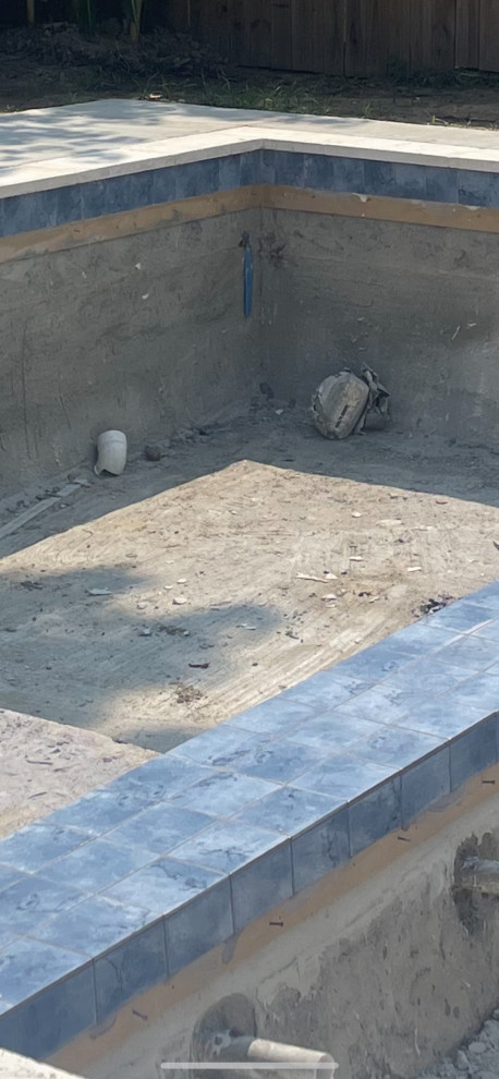 Matching pool waterline tile and plaster