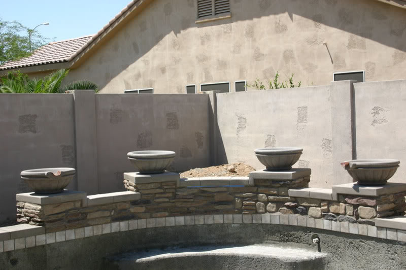 Installing scupper wok pots