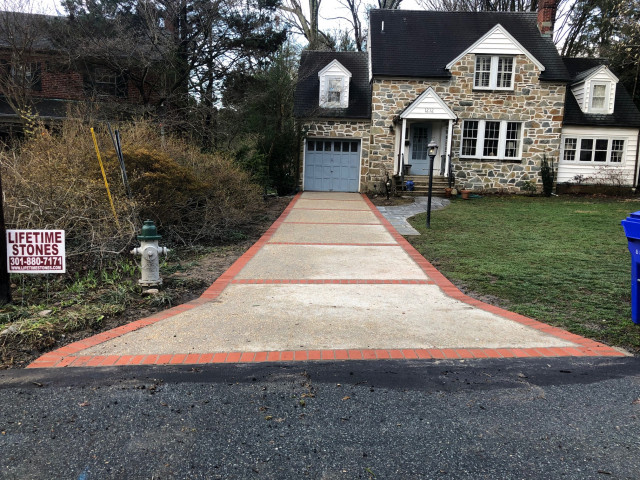 Exposed Aggregate Concrete Driveway with Brick Paver Border in Silver ...