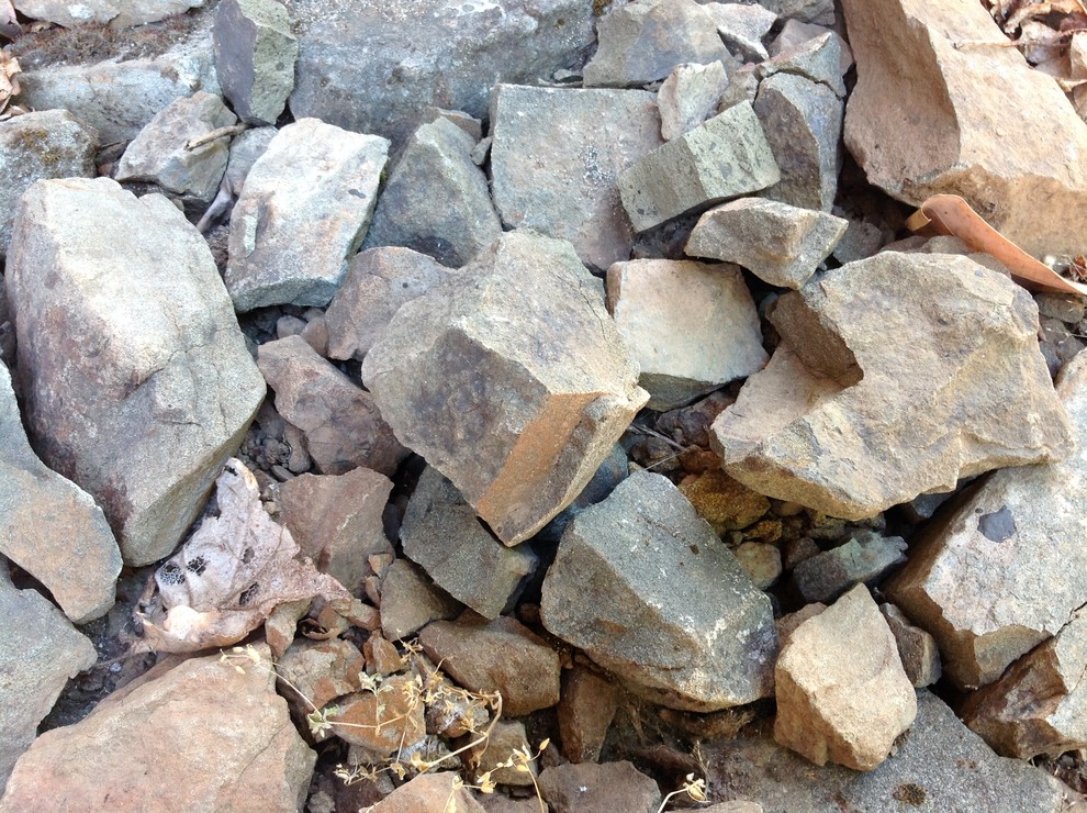 What to do with hundreds of small jagged rocks?