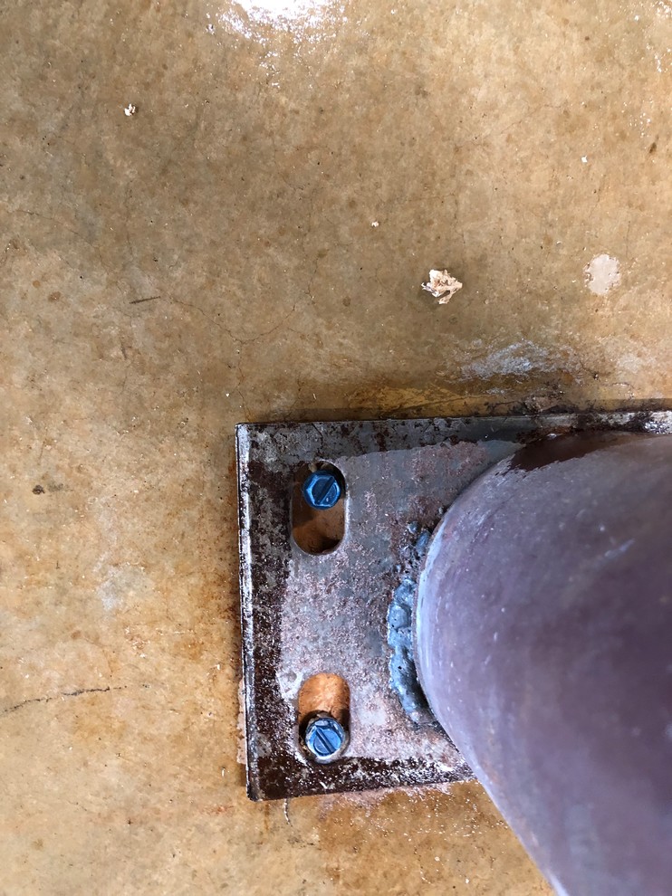 How should the support posts be secured to the beam & floor?