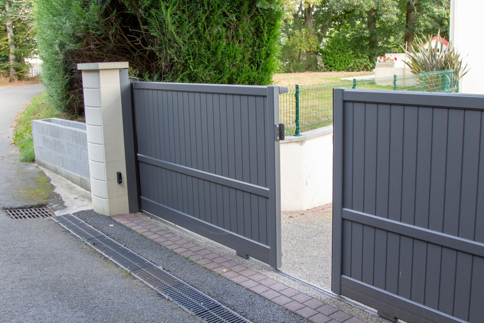 Installation d'un portail coulissant à double refoulement Split Sliders ...