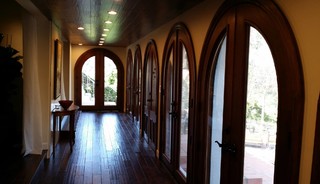 William Shatner Home Makeover - Rustic, Mahogany Arched Doors -After ...