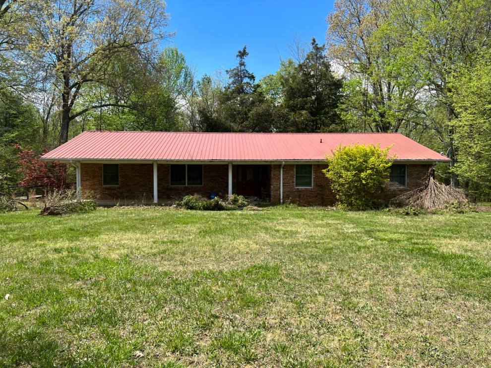 Brick ranch with red roof. Help!