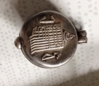 What do Symbols on locket mean?