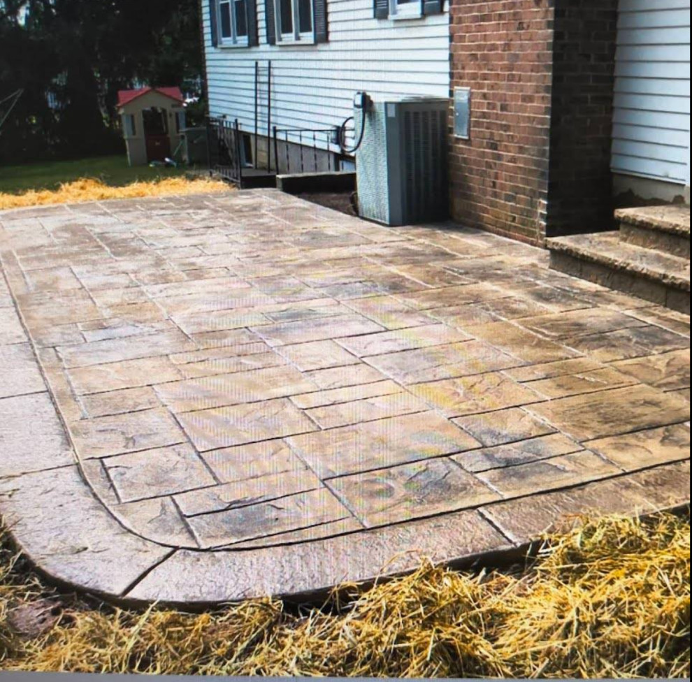 Misaligned stamped concrete pattern... opinions moving forward?