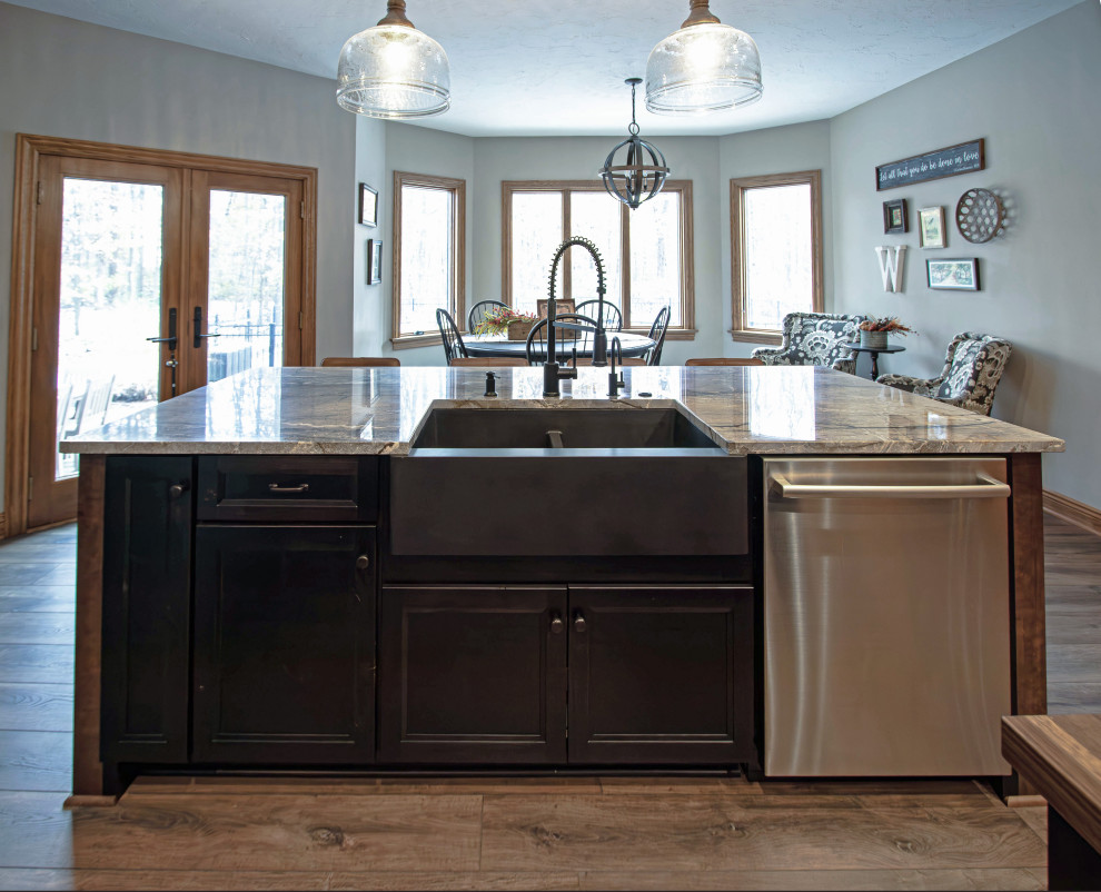 Reconfigured kitchen with new islands, countertops, backsplash ...