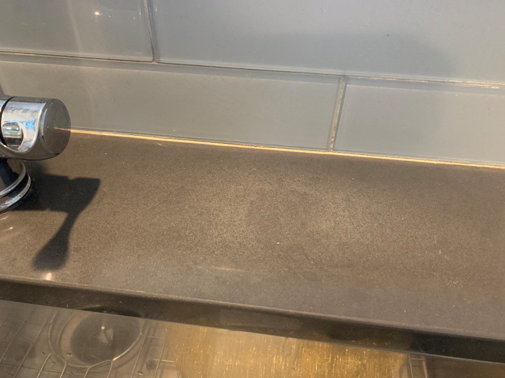 What is this white haze on quartz and how can it be removed?