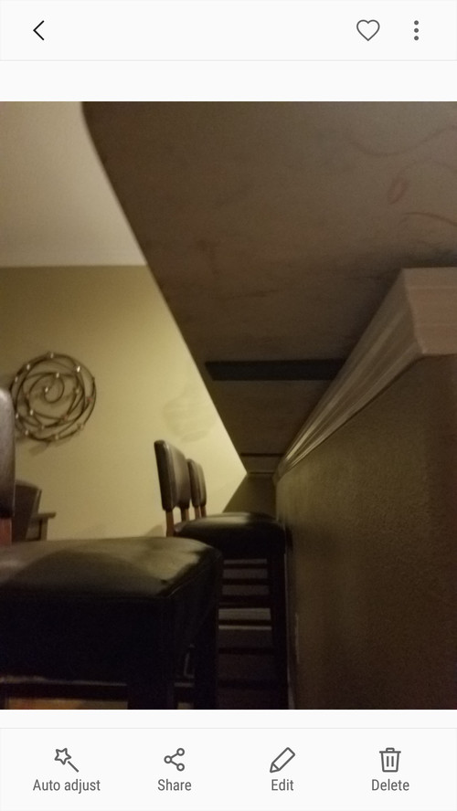 How do you install stacked stone to a wall with rounded corners?