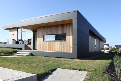 Neat fascia and external cladding. What system? Alucabond? FC Sheet?