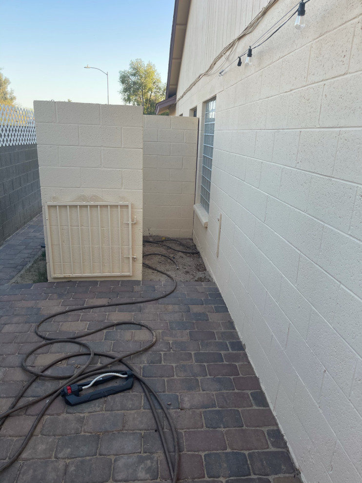 adding space to master bathroom, bump out? brick house