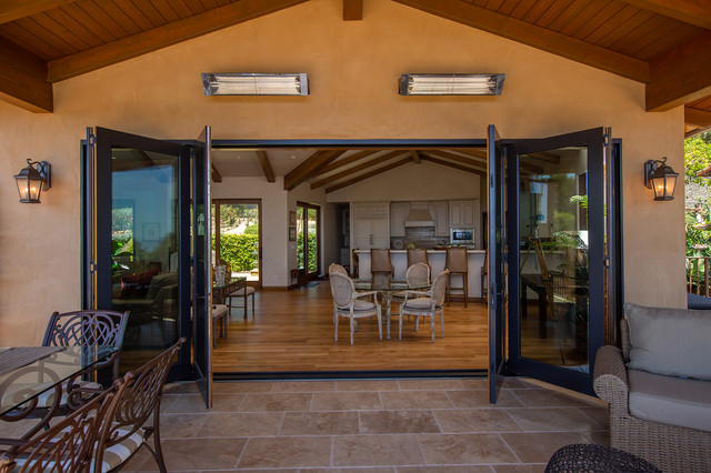 Folding Door Systems Create Open-Air Dining in a Spanish Style Home ...