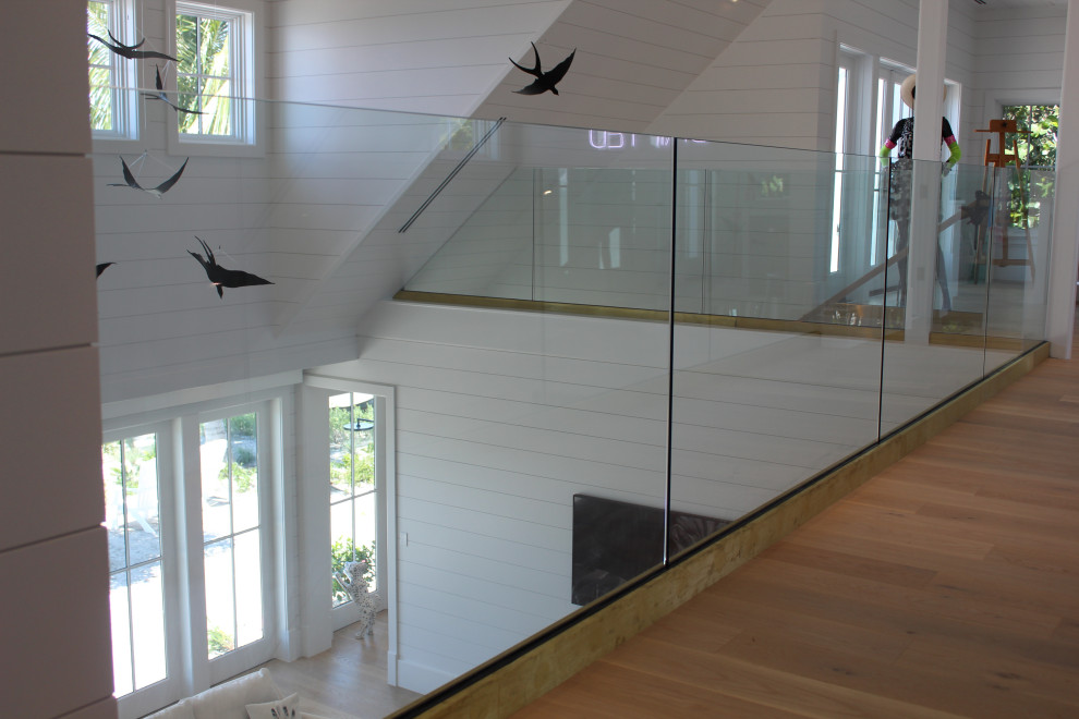 Glass Balustrade with Aluminum Base Rail Finished with Satin Brass ...