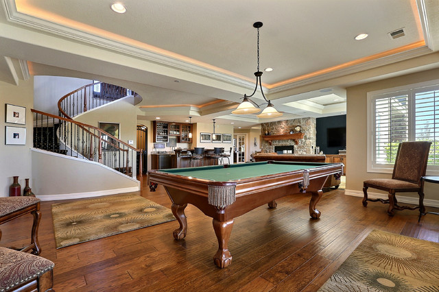 Artisan Castle Rock Basement with custom wood accent home bar ...