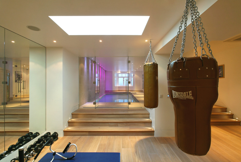 Basement conversion showing light source through glass panel in garden ...