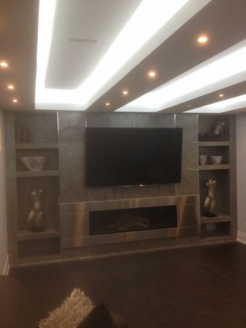Basement entertainment unit and fireplace - Modern - Basement - Toronto ...