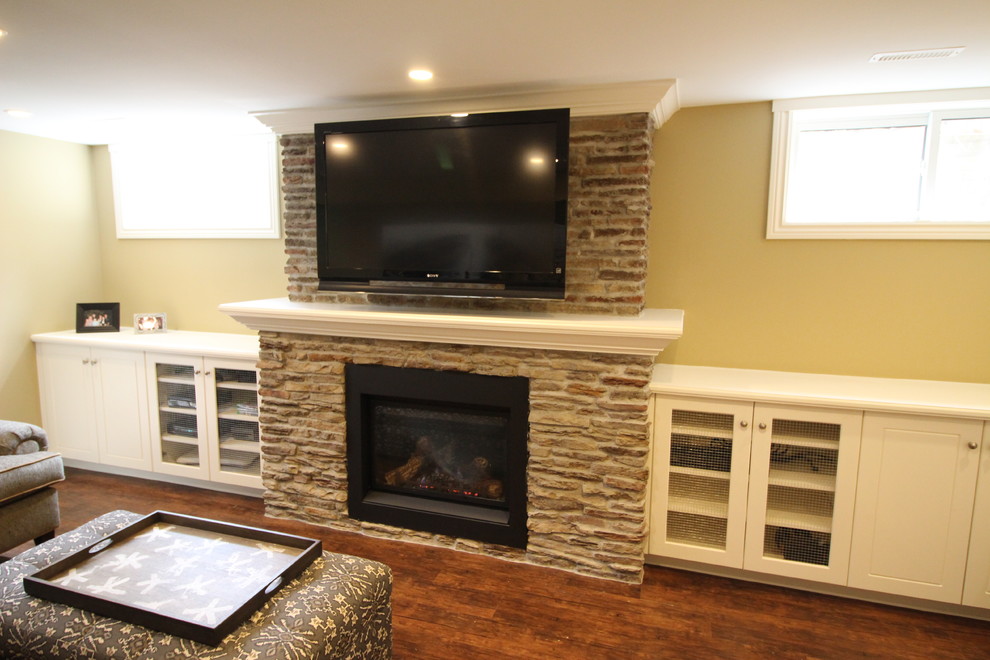 Basement recreation room with new stone fireplace and built-ins ...