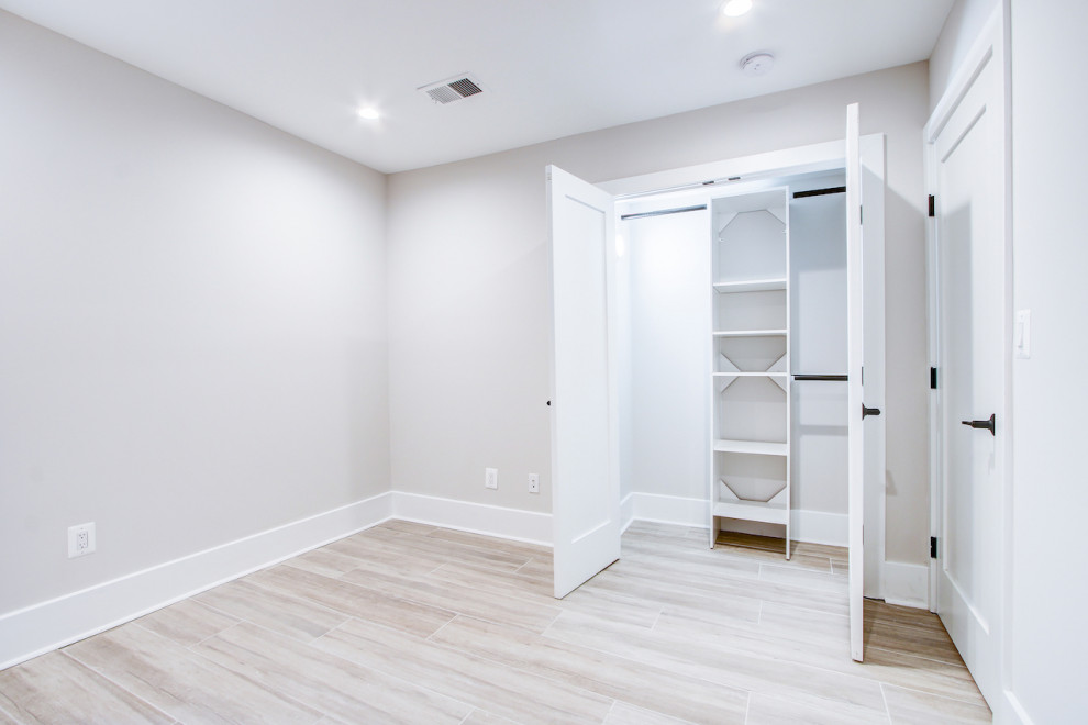 Basement remodeled with bedroom space and extra closet space in ...