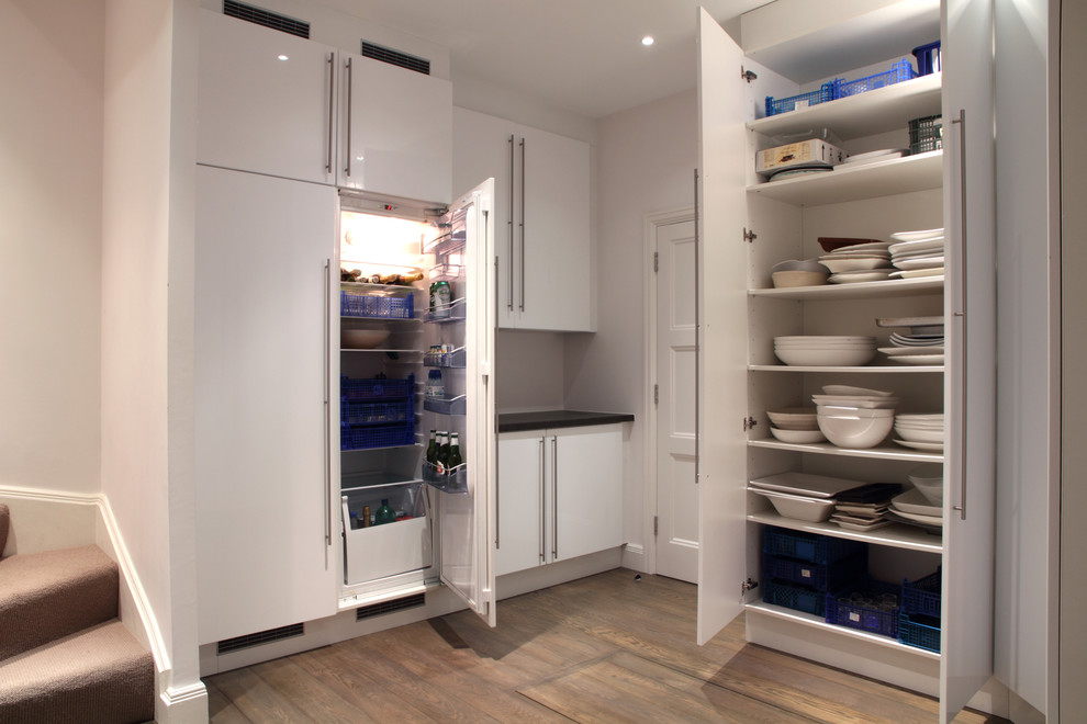 Basement Storage and Utility Space - Contemporary - Basement - London ...