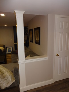 Custom pillar trim gives an elegant feel to support beams - Traditional ...