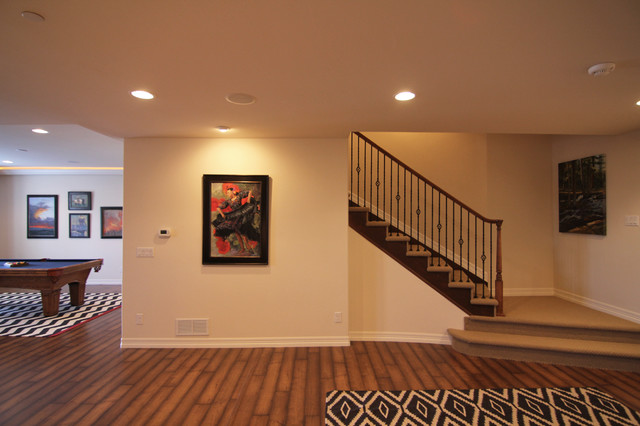 Modern Castle Pines Basement with Entertainment areas and stacked stone ...