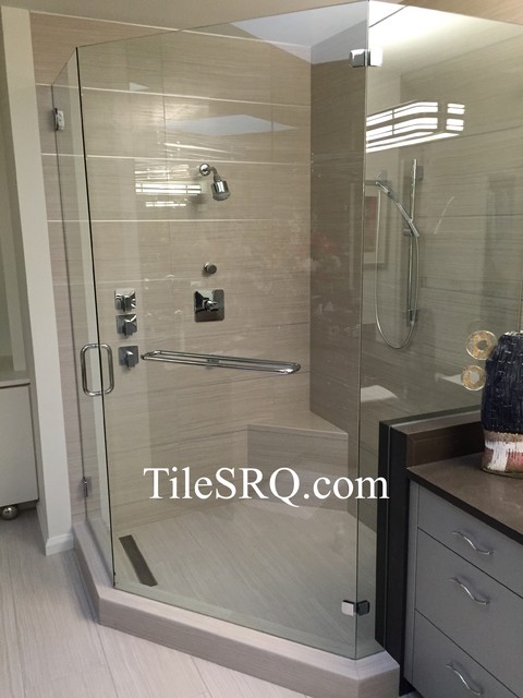 Custom-built shower using chrome Schluter in between each row of tile ...