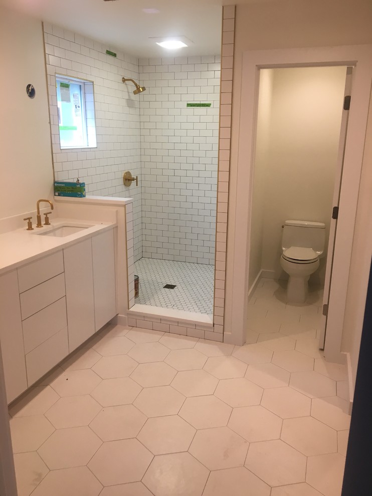 Gold Schluter trim to coordinate with the fixtures. Can't wait to see ...