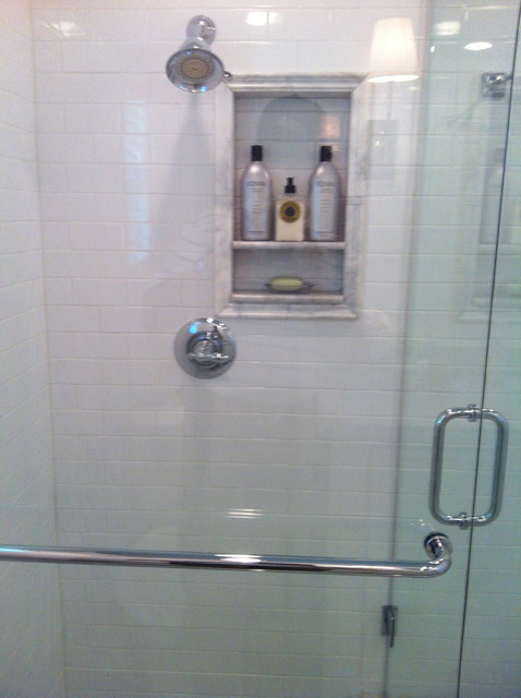Jack & Jill bath converted to sleek marble restroom & shower ...