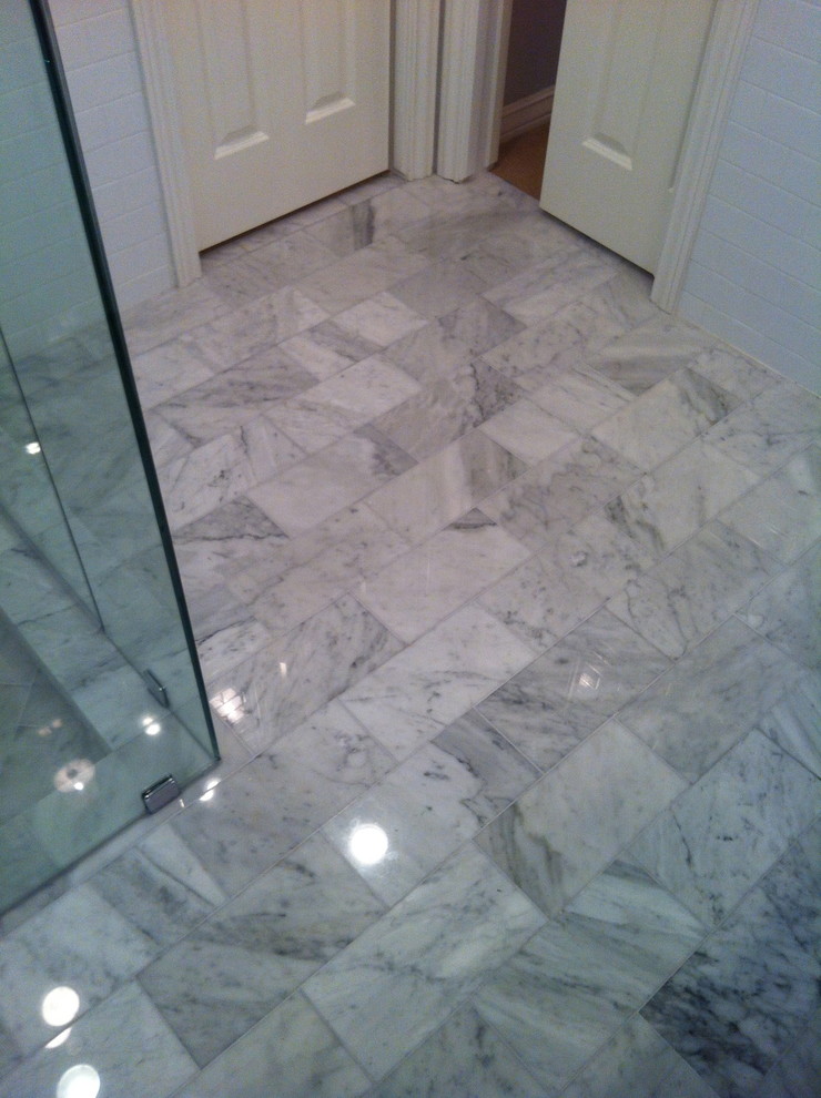 Jack & Jill bath converted to sleek marble restroom & shower ...