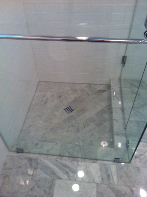 Jack & Jill bath converted to sleek marble restroom & shower ...