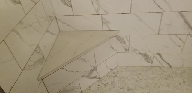 Marble Shower with Penny Tile Floor & Corner Bench Seat - Bathroom - by ...