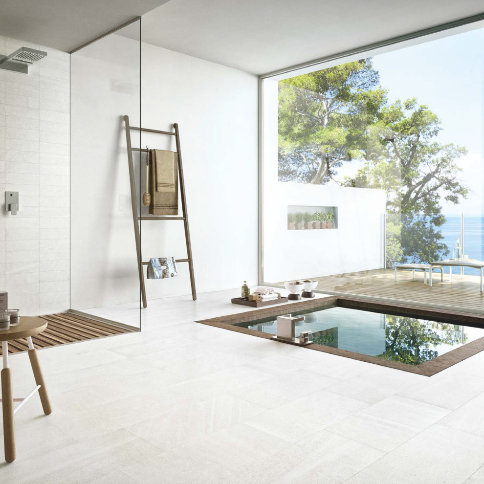 Modern white bathroom with white stone look porcelain tiles - Modern ...