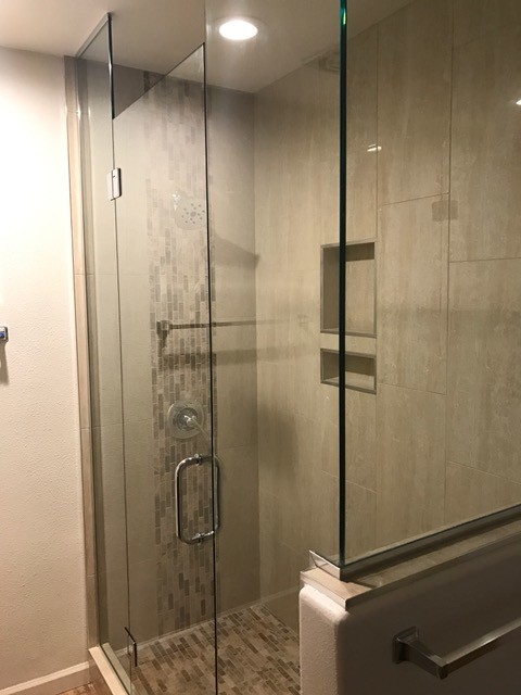 Polished porcelain tile shower with vertical deco band - Traditional ...