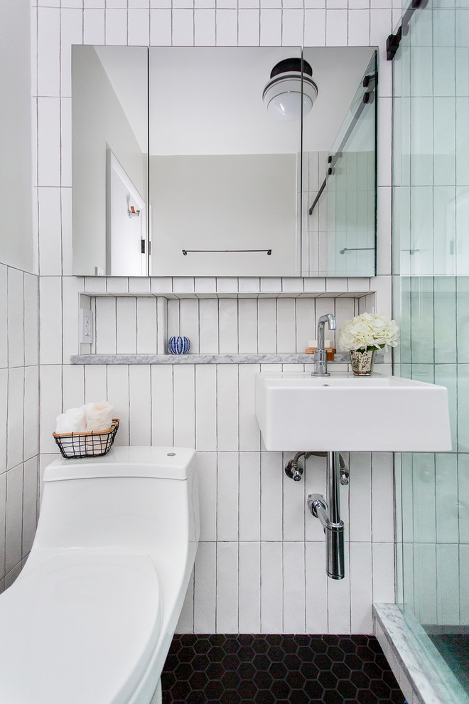 Renovated bathroom with vertically-stacked subway tile - Modern ...