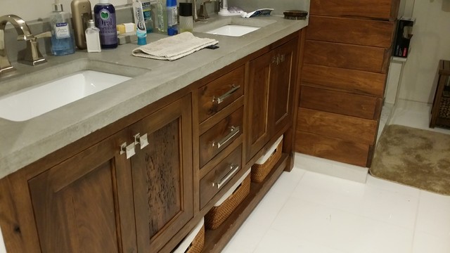 Walnut vanity with concrete top and walnut accent wall - Craftsman ...