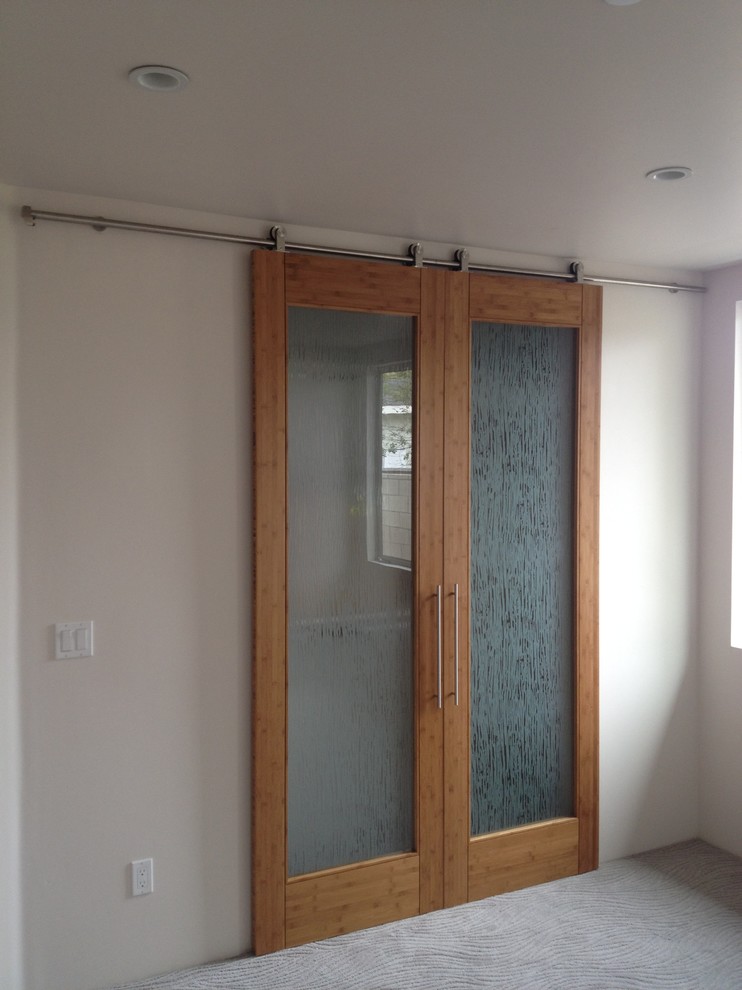 Bamboo door on barn door style hardware - Contemporary - Bedroom - San ...