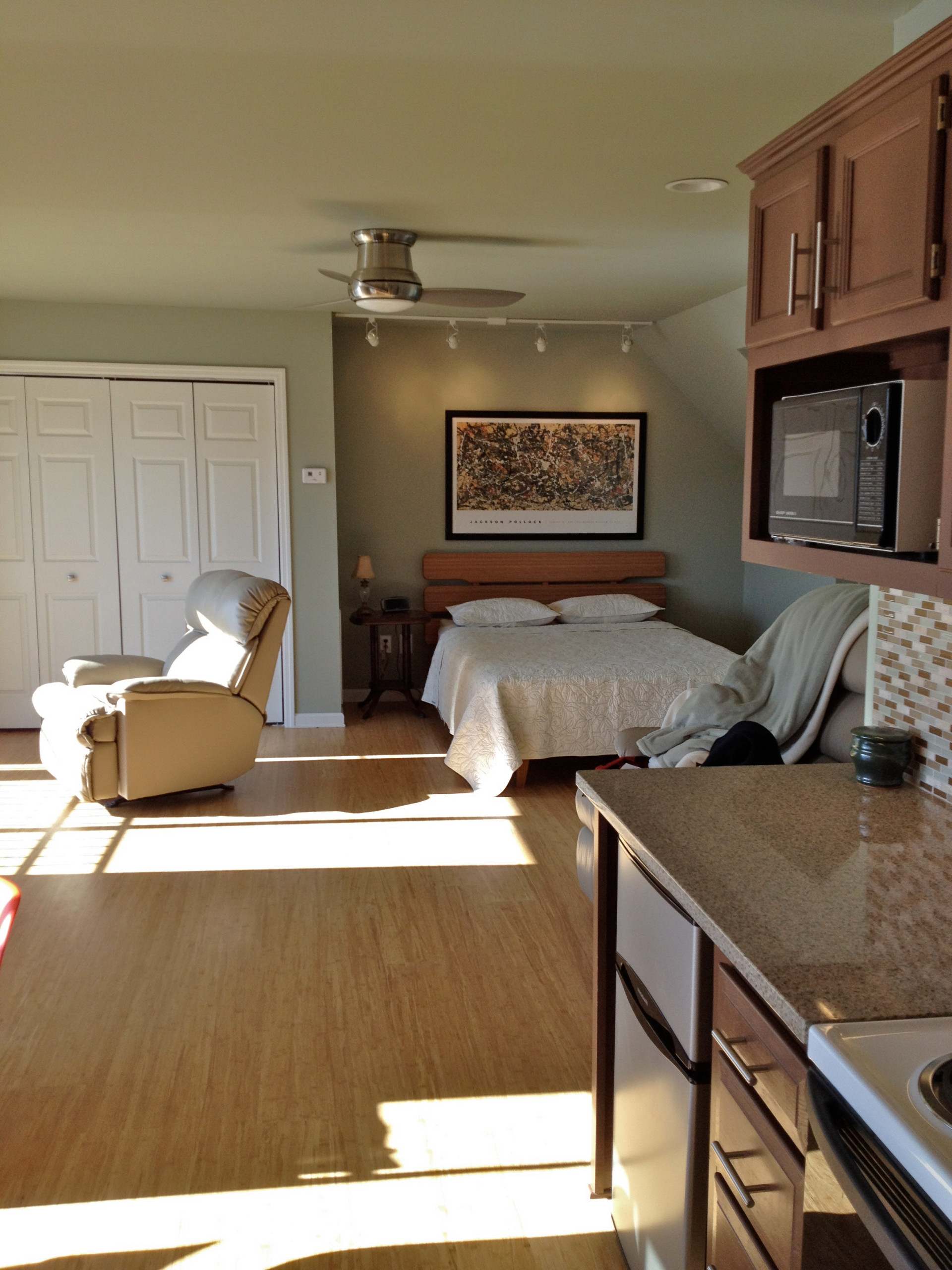 Elegant Studio Apartment Design Ideas With Brown Color Nuance And Wooden Floor