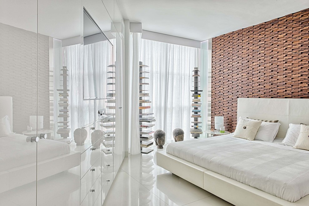Modern white bedroom with custom cabinetwall and wooden headboard ...