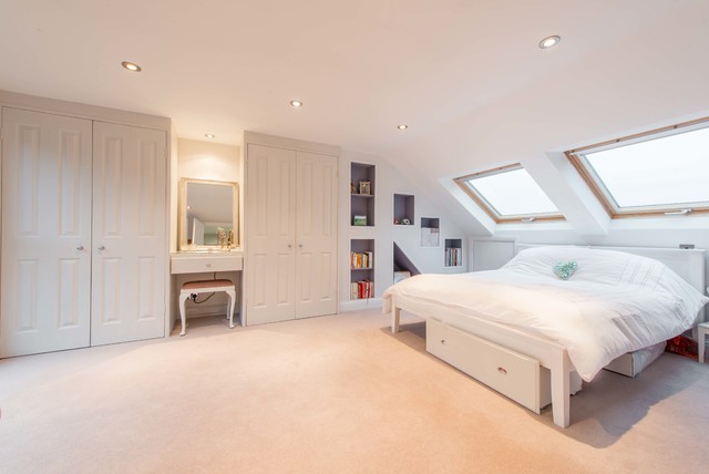 Recess feature shelving in master bedroom loft conversion ...