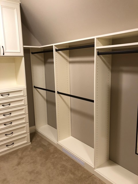 Beautiful Antique White Walk-In Closet with Angled Walls - Traditional ...