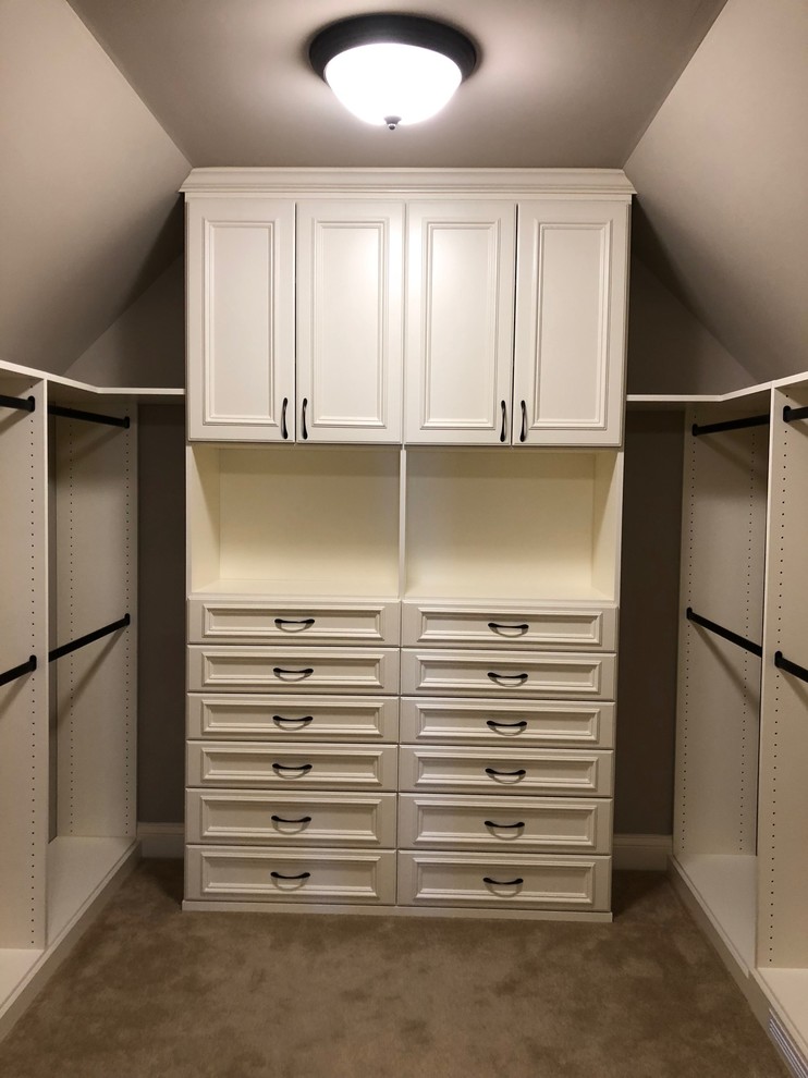 Beautiful Antique White Walk-In Closet with Angled Walls - Traditional ...