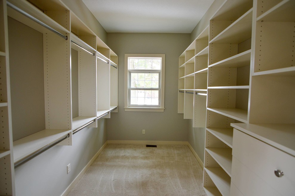 Plentiful walk-in closet cabinets - Traditional - Closet - Cleveland ...